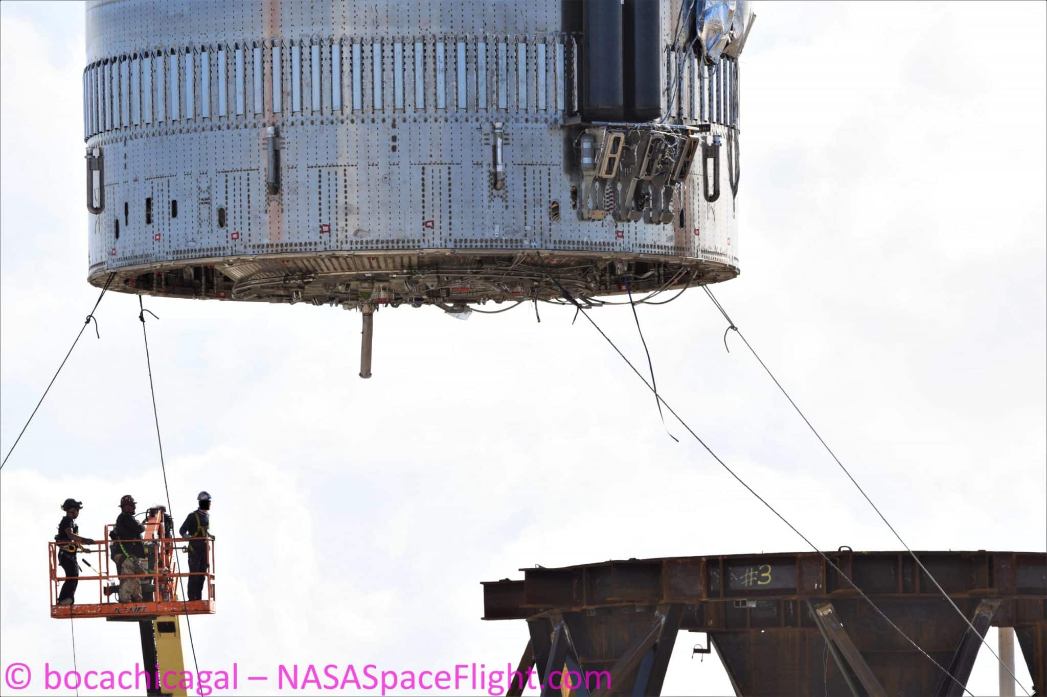 SpaceX begins installing Raptor engines on first Super Heavy booster ...