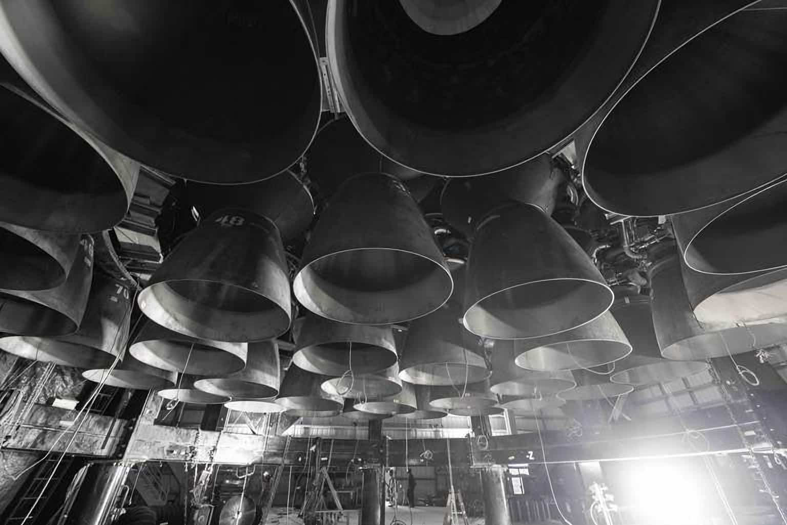 SpaceX installs Super Heavy booster on launch mount with giant robot ...