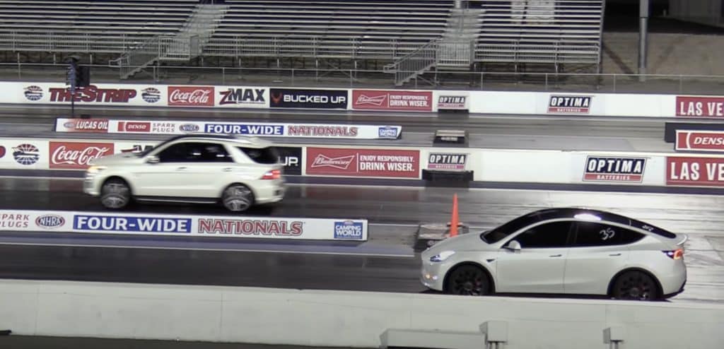 Tesla Model Y driver starts race in reverse, still wins against AMG SUV ...