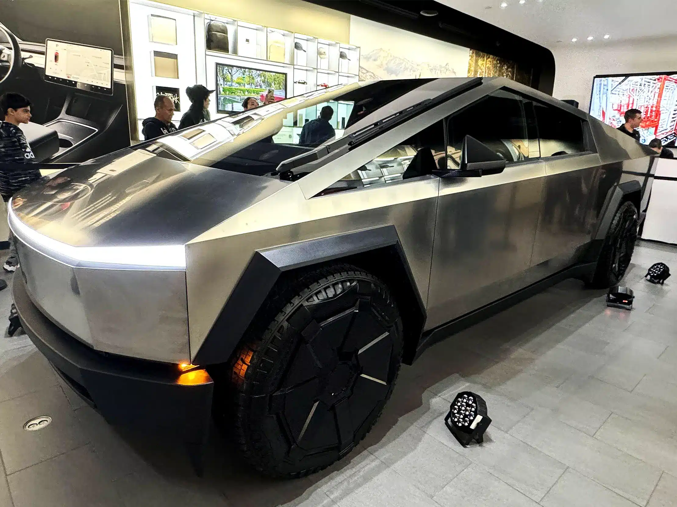 Navigating the Electric Highway: Tesla's Armored Vehicle Contract and ...